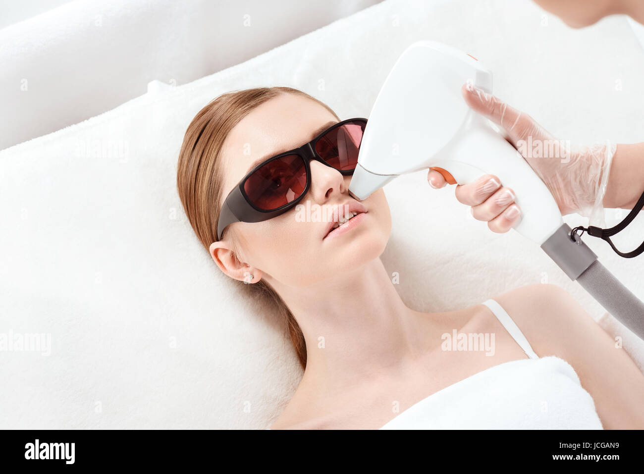Skin laser on face hi-res stock photography and images - Alamy