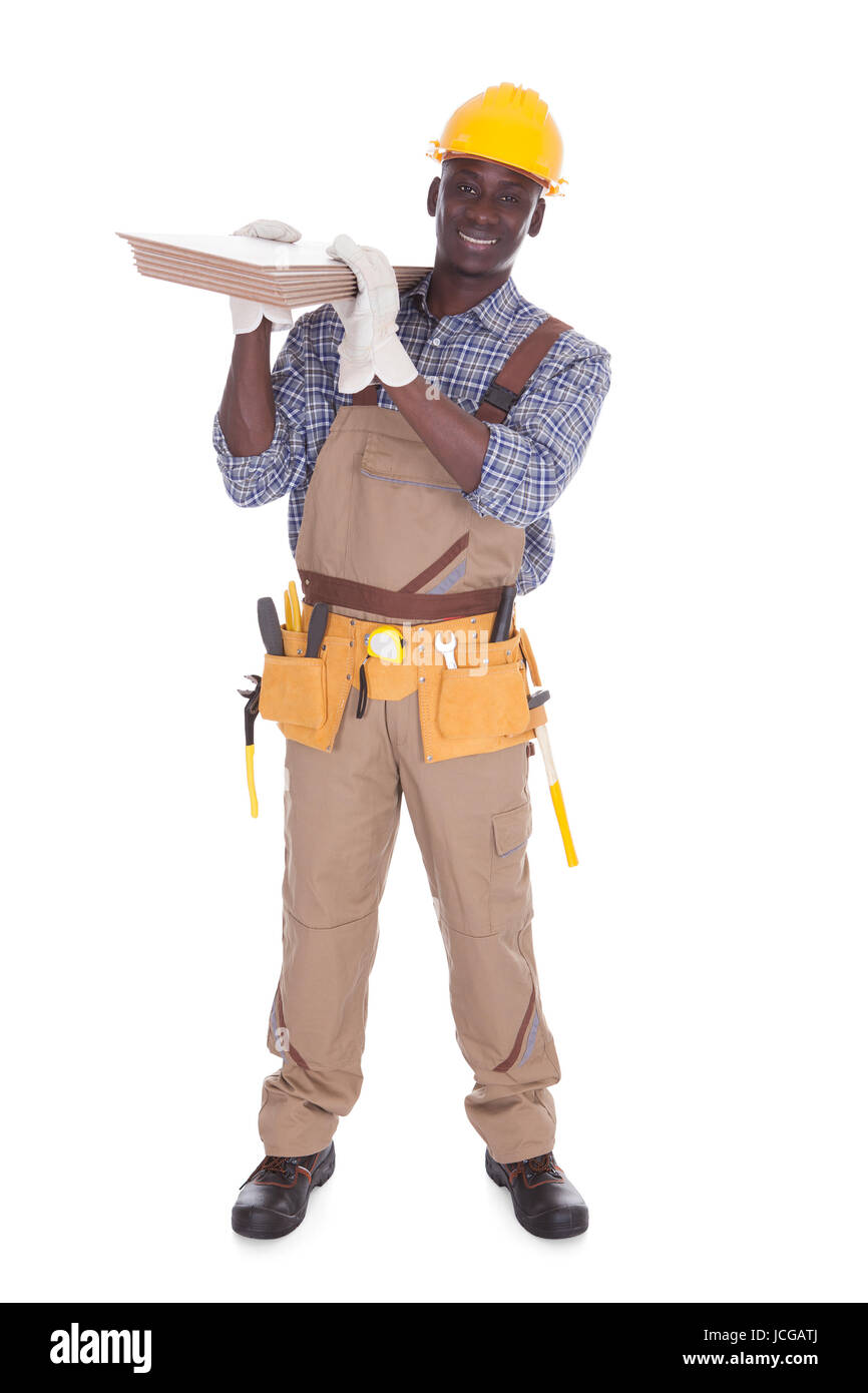 Young Happy Craftsman Carrying Floor Tiles Over White Background Stock ...