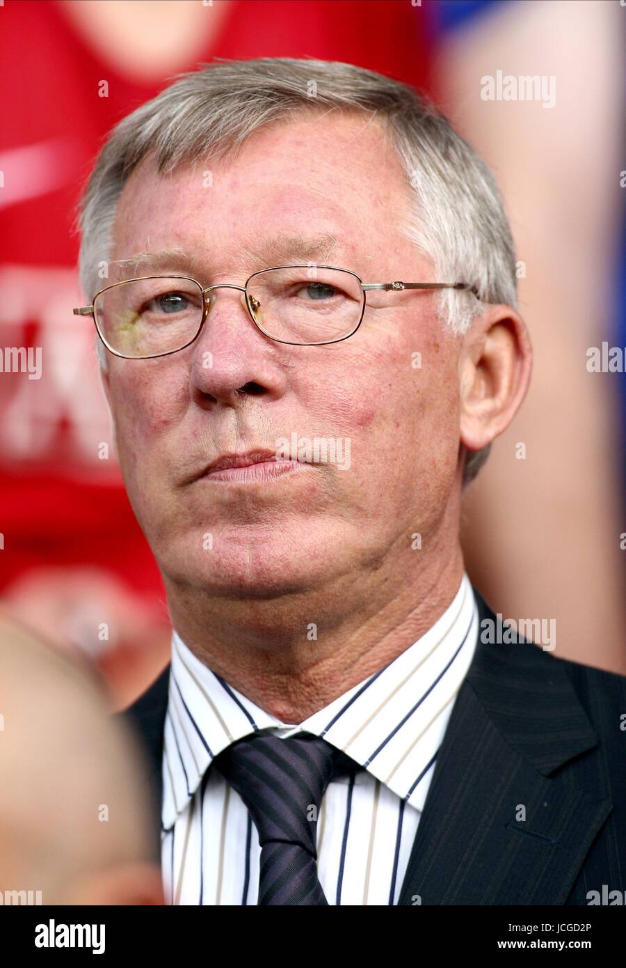 Manchester united manager sir alex ferguson on the bench hi-res stock ...
