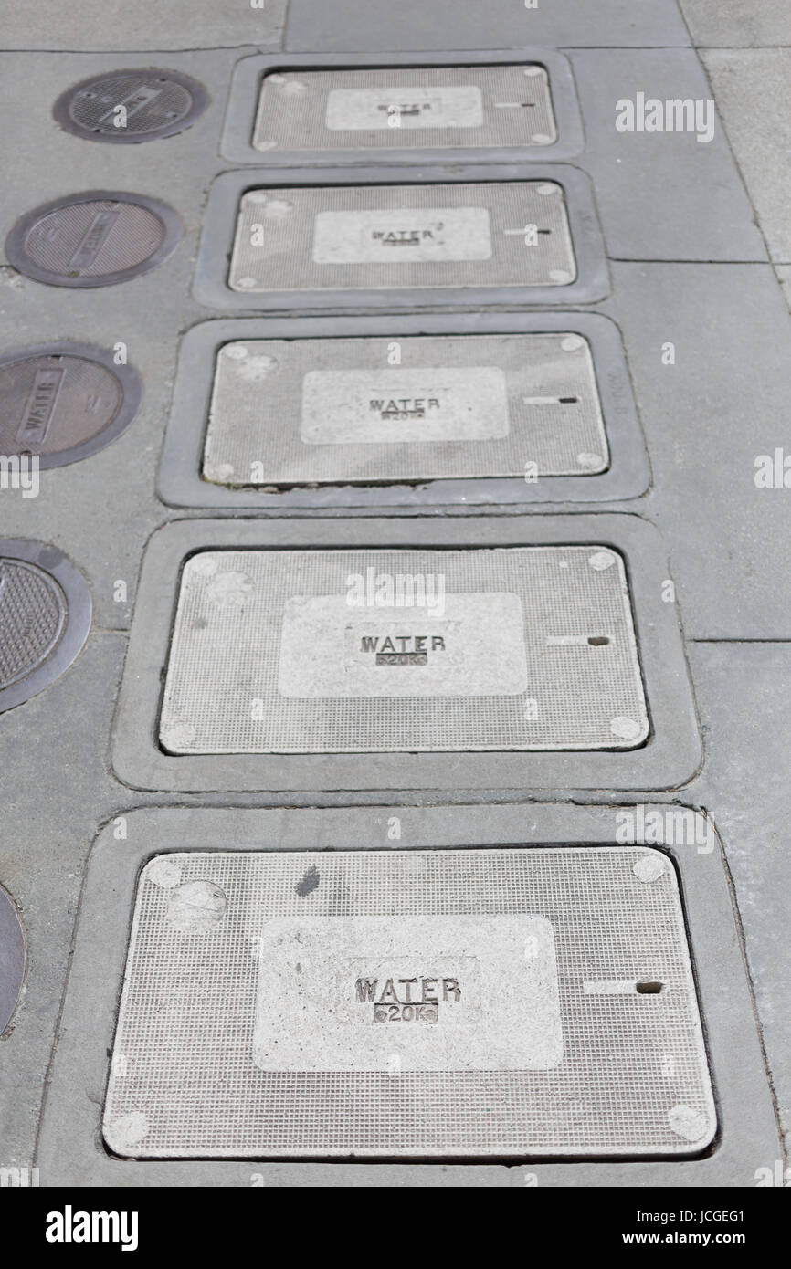 Water outlet manhole covers in Monterey Stock Photo - Alamy