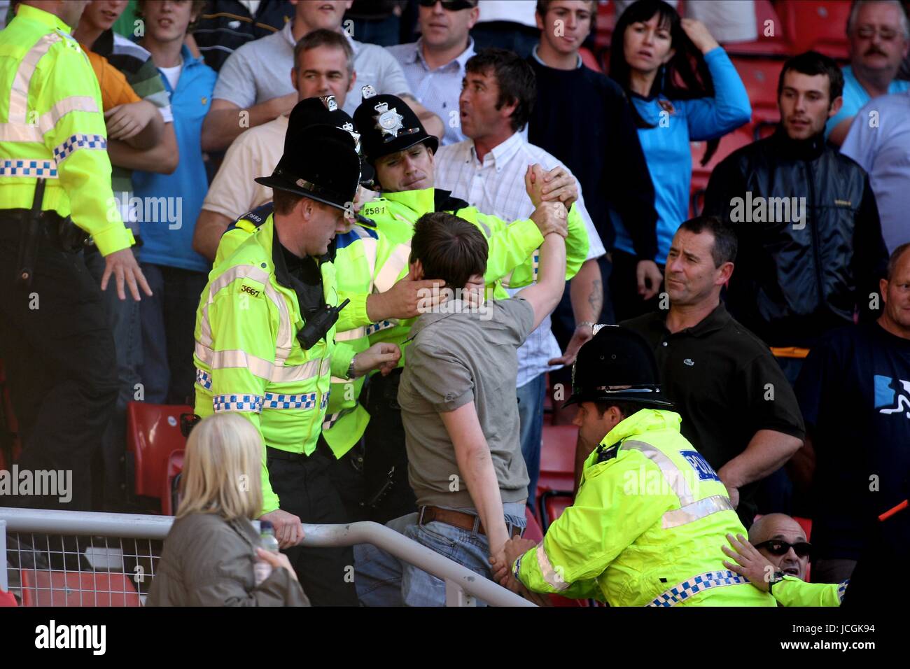 Police arrest fan hi-res stock photography and images - Alamy