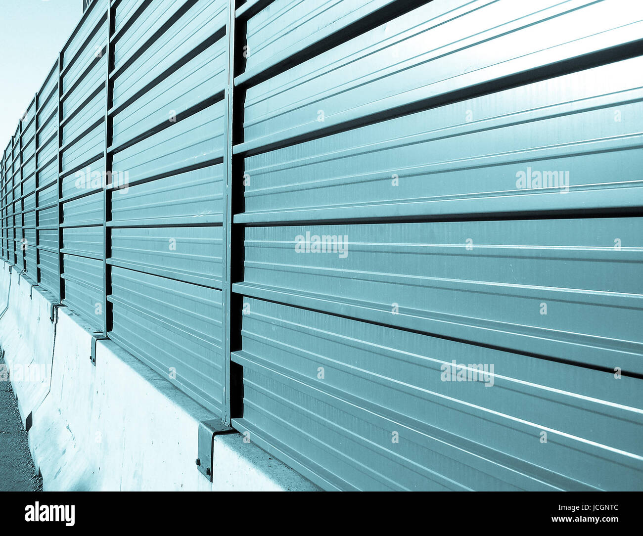 Provisional metal fence for road works - cool cyanotype Stock Photo - Alamy