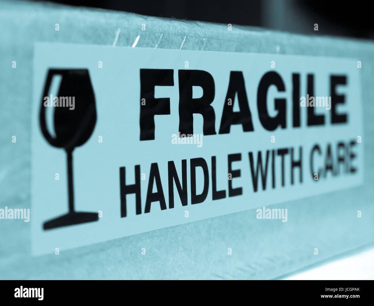 Detail of a fragile corrugated cardboard packet - cool cyanotype Stock Photo - Alamy