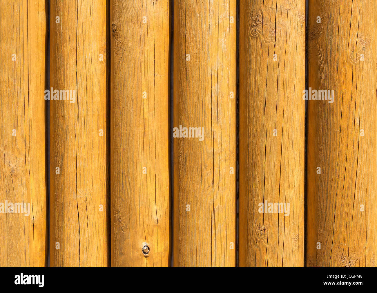 Wooden logs fence texture background Stock Photo - Alamy