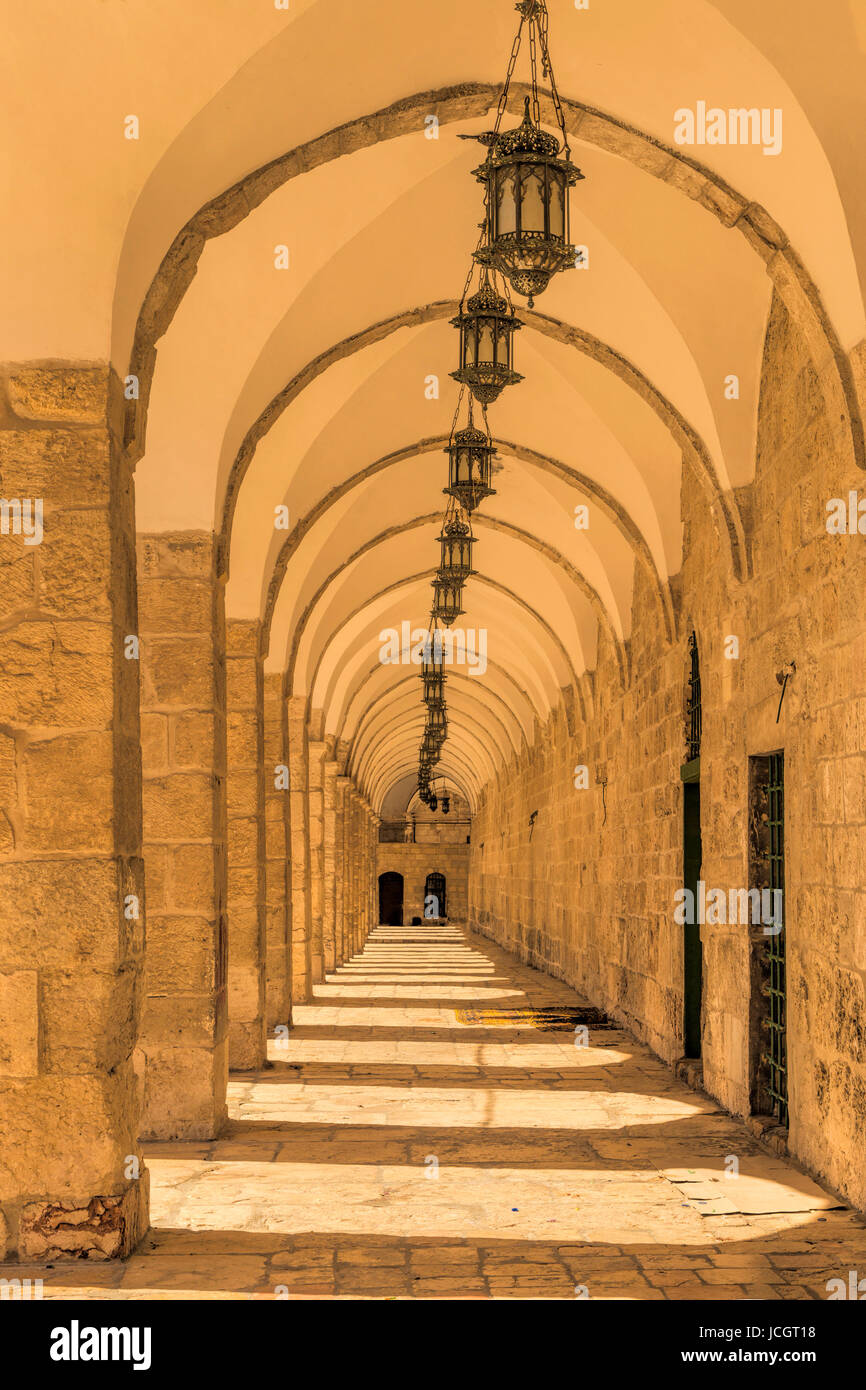 Classic stone arches with lanterns in the Old City of Jerusalem, Israel ...