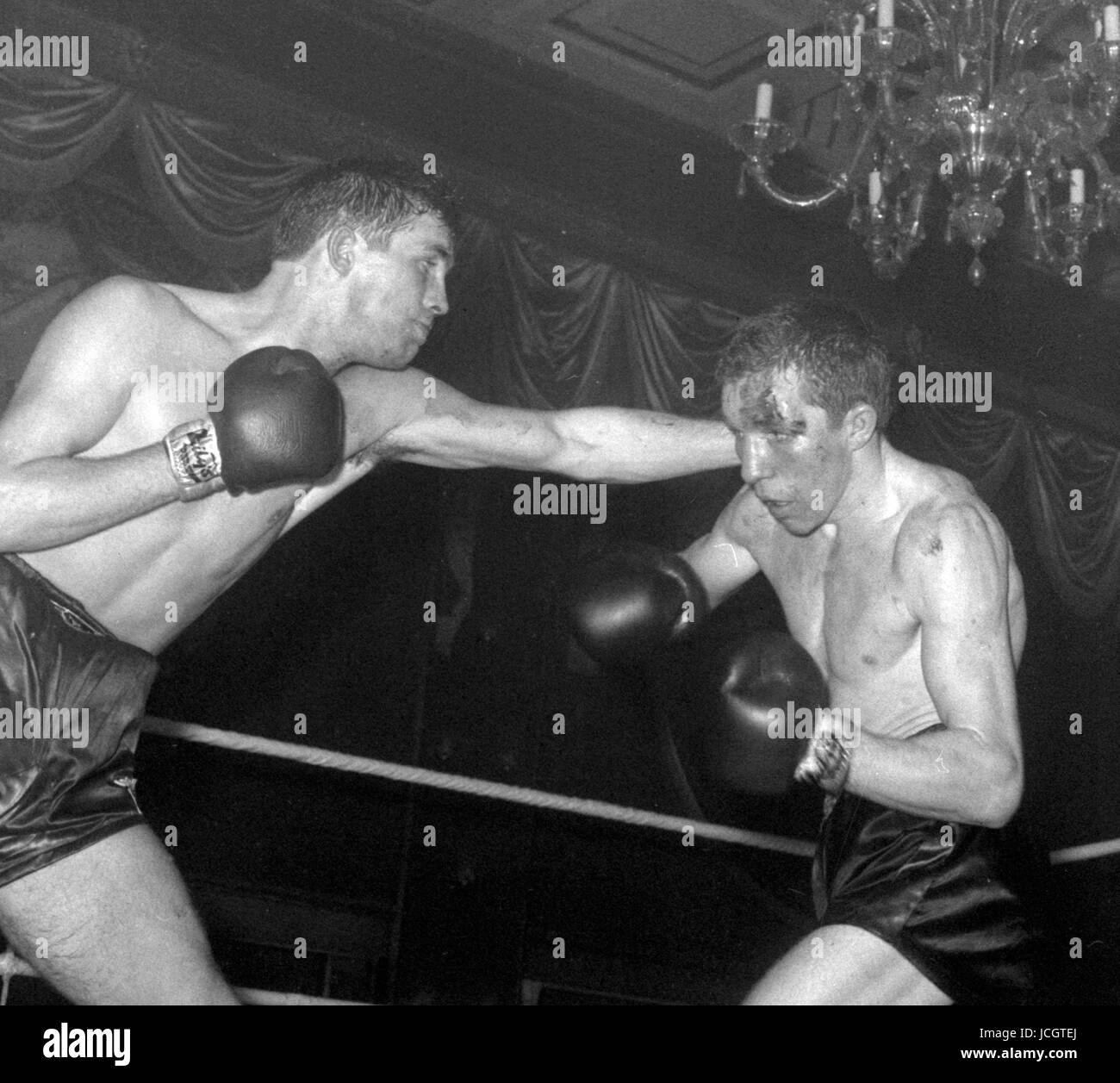 Welshman Howard Winstone (l) leads with a powerful left to Glasgow's ...