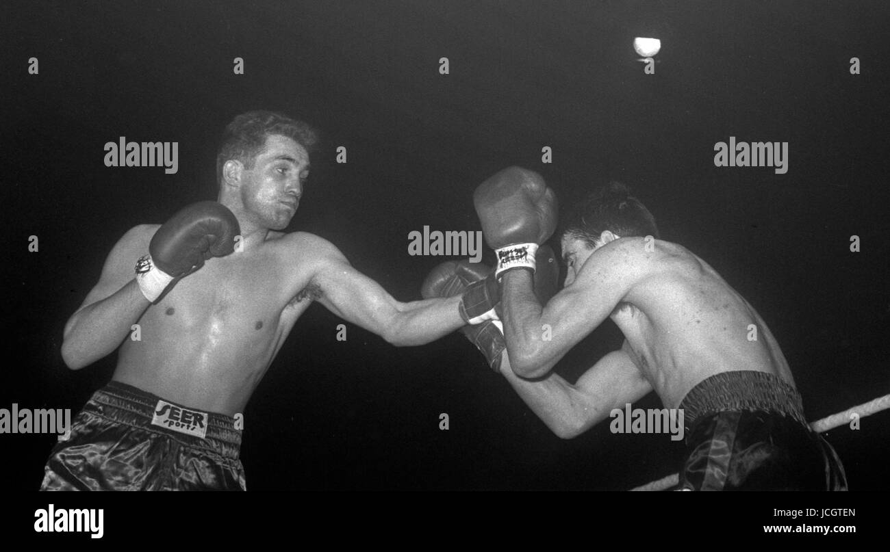 Welshman Howard Winstone (l), of Merthyr Tydfil, gets through the guard ...