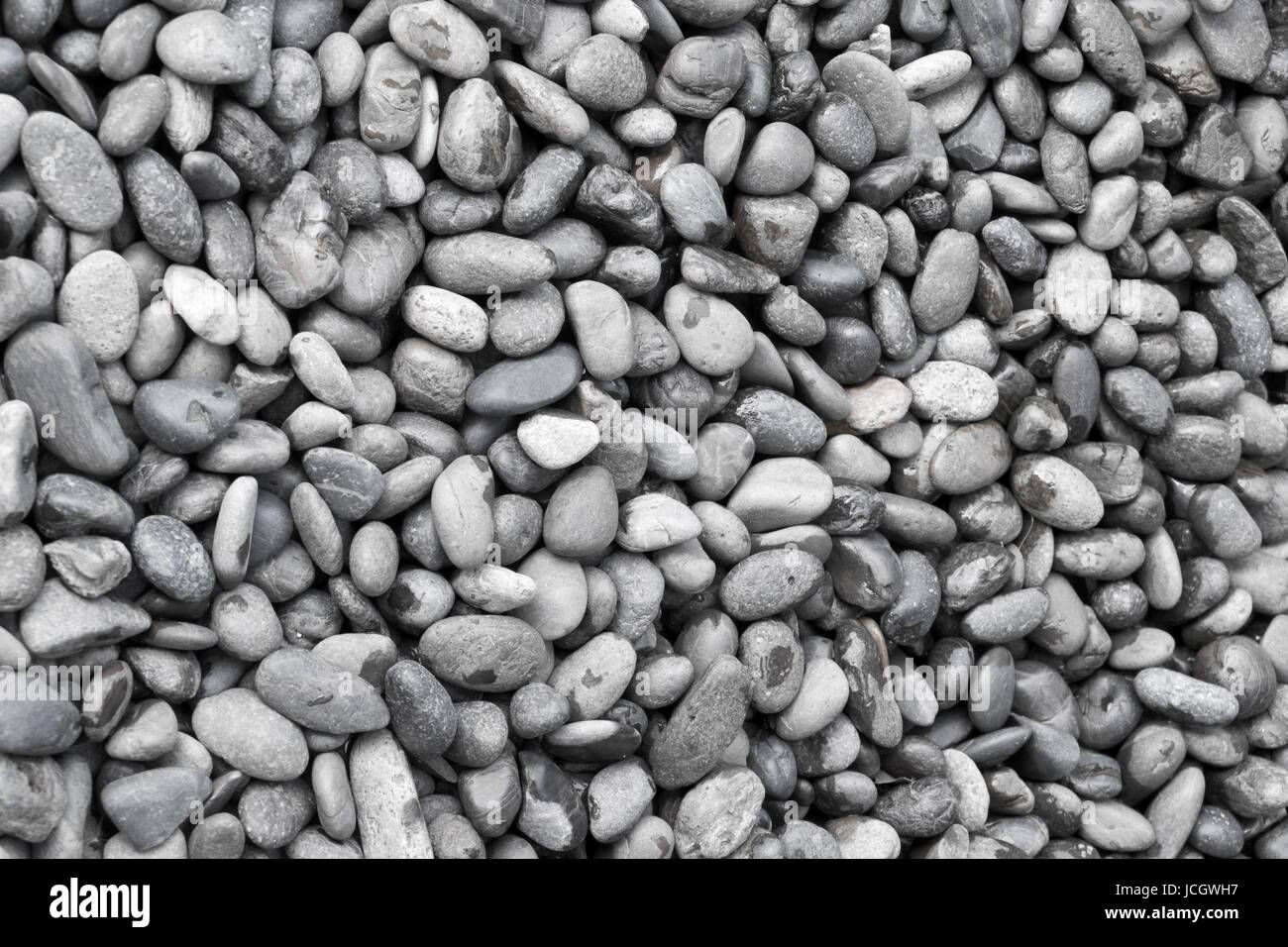 Background Pattern, Naturally Polished Black Rock Pebbles Background ...
