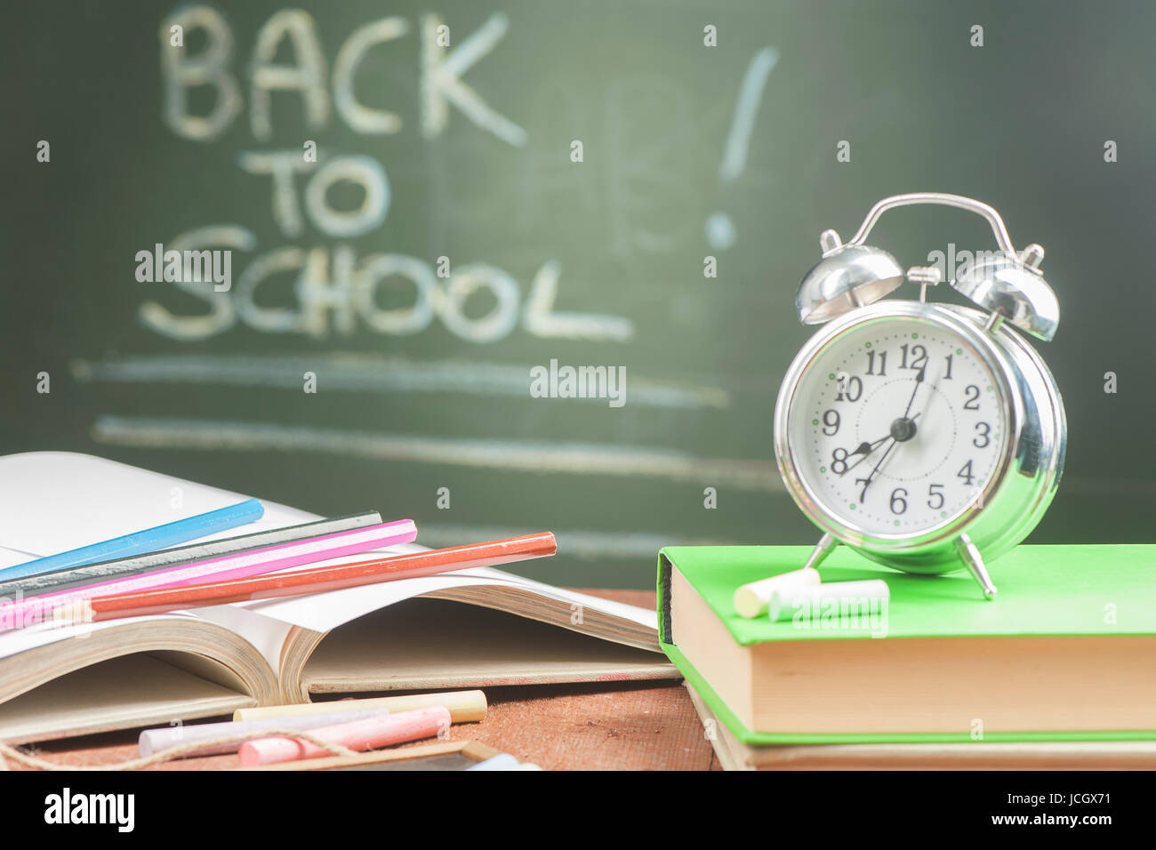 Stack of books in classroom. Back to school concept Stock Photo - Alamy