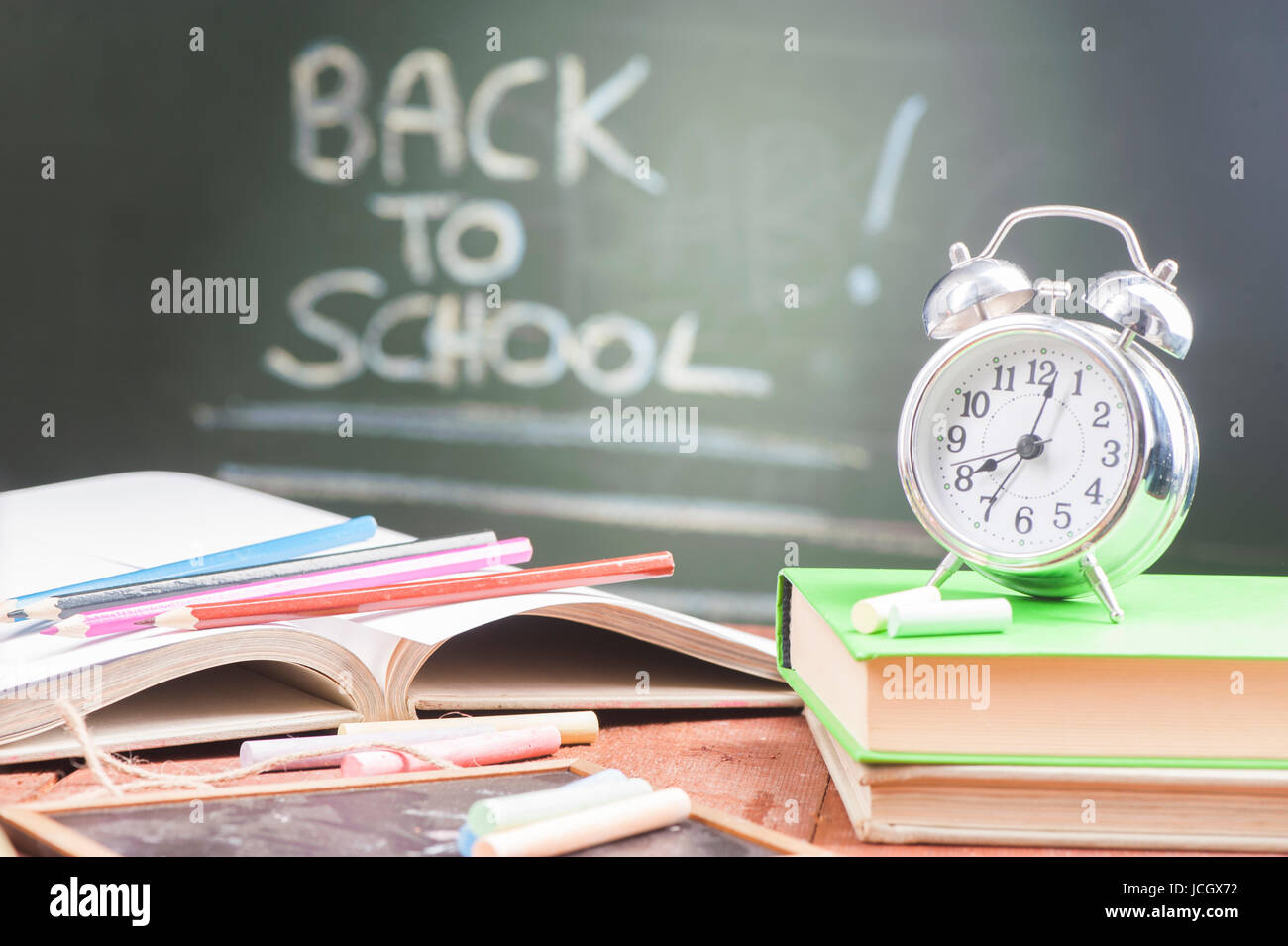 Stack of books in classroom. Back to school concept Stock Photo - Alamy
