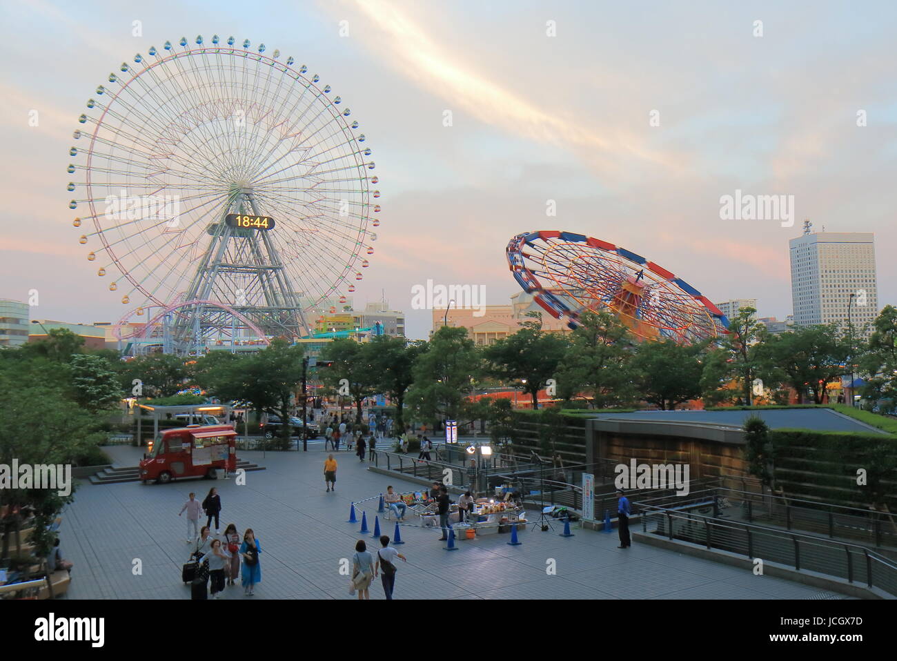 People visit Cosmo World in Yokohama Japan. Cosmo World is an amusement ...