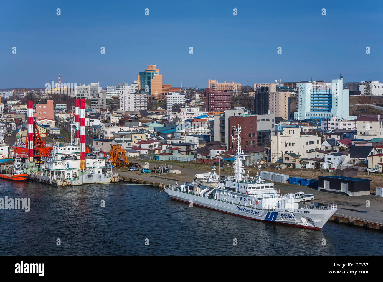 A Japanese Coast guard ship and the port of Kushiro city Subprefecture ...