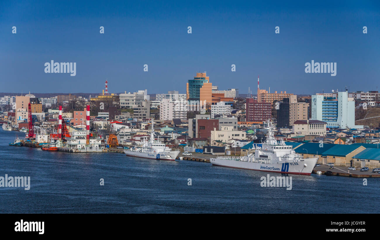 A Japanese Coast guard ship and the port of Kushiro city Subprefecture ...