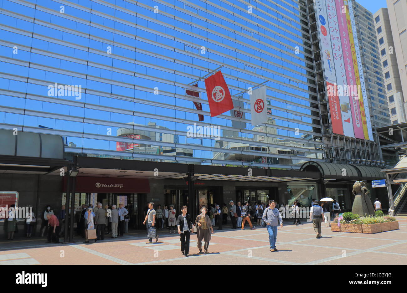 People visit Takashimaya department store in Yokohama Japan ...