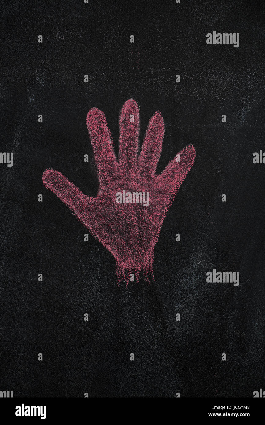 Hand shape drawn with red chalk on blackboard Stock Photo - Alamy
