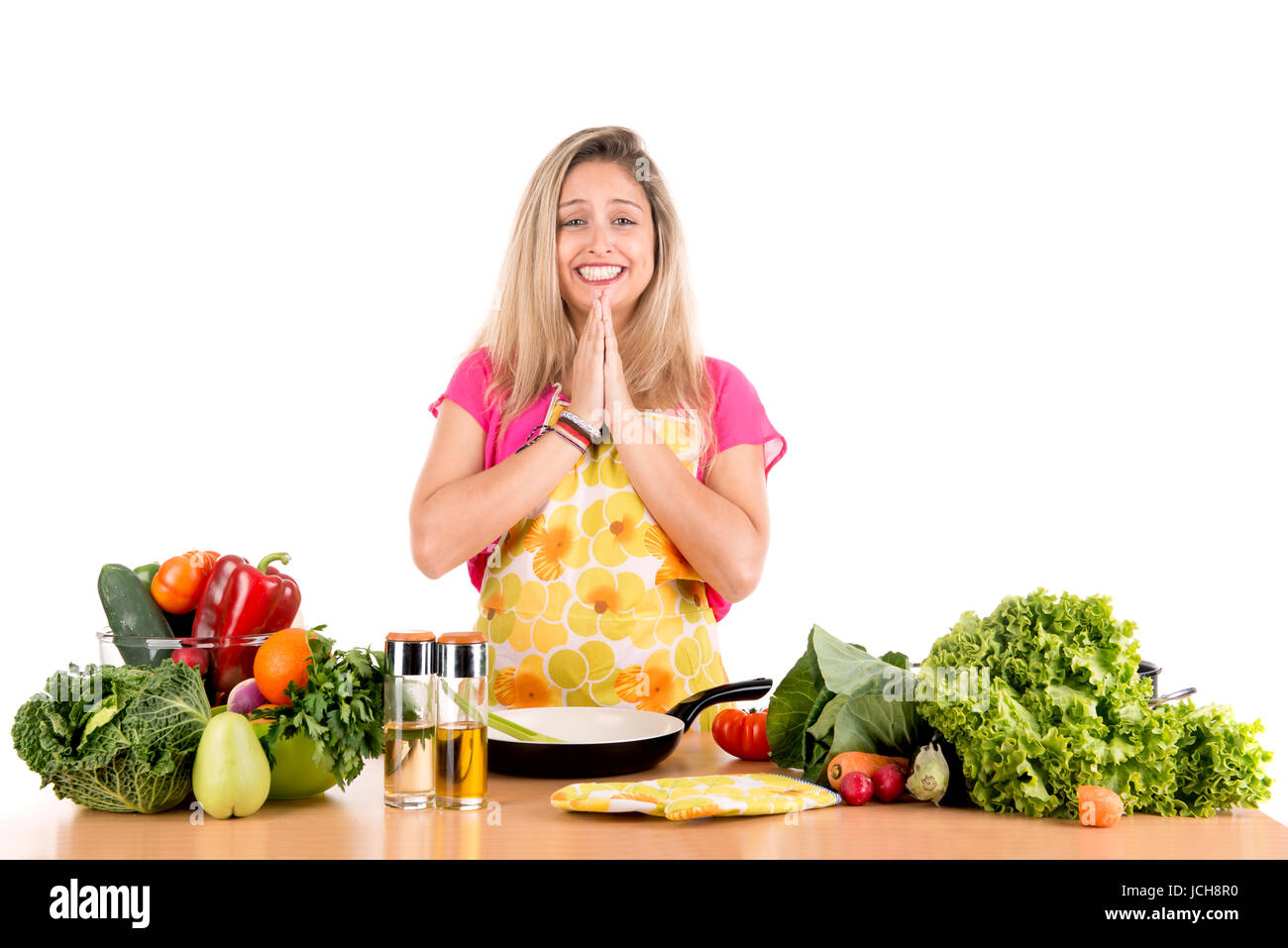 Beautiful woman cooking in the kitchen Stock Photo - Alamy