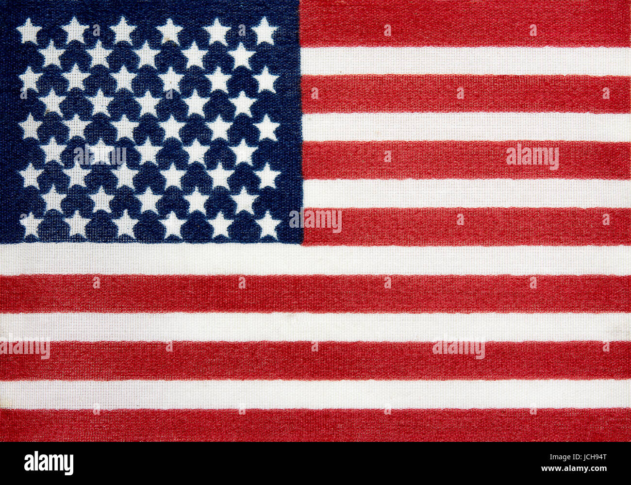 bright American flag design on textured fabric Stock Photo - Alamy
