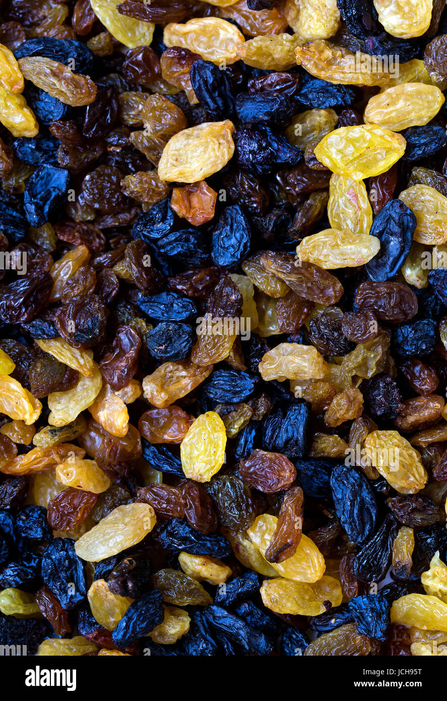 Background dried raisin grapes closeup shot Stock Photo - Alamy