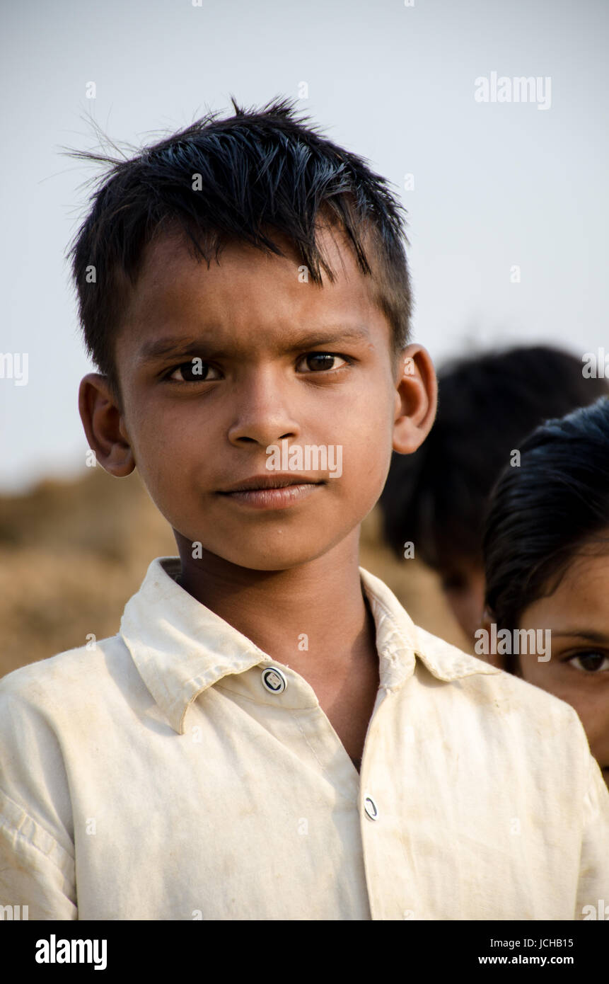 Sad indian boy hi-res stock photography and images - Alamy