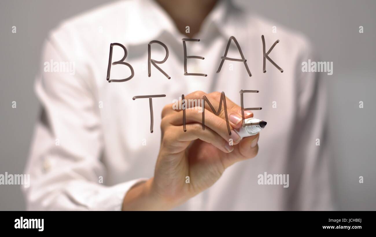 Woman writing Break Time on transparent screen. Businesswoman write on ...