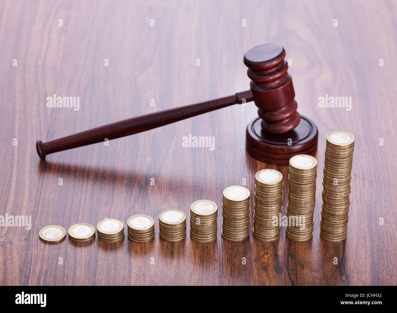 Pile money gavel hi-res stock photography and images - Alamy