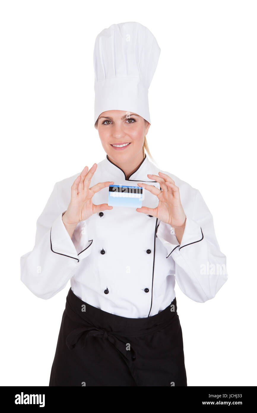 Portrait Of Happy Female Chef Holding Credit Card Over White Background ...