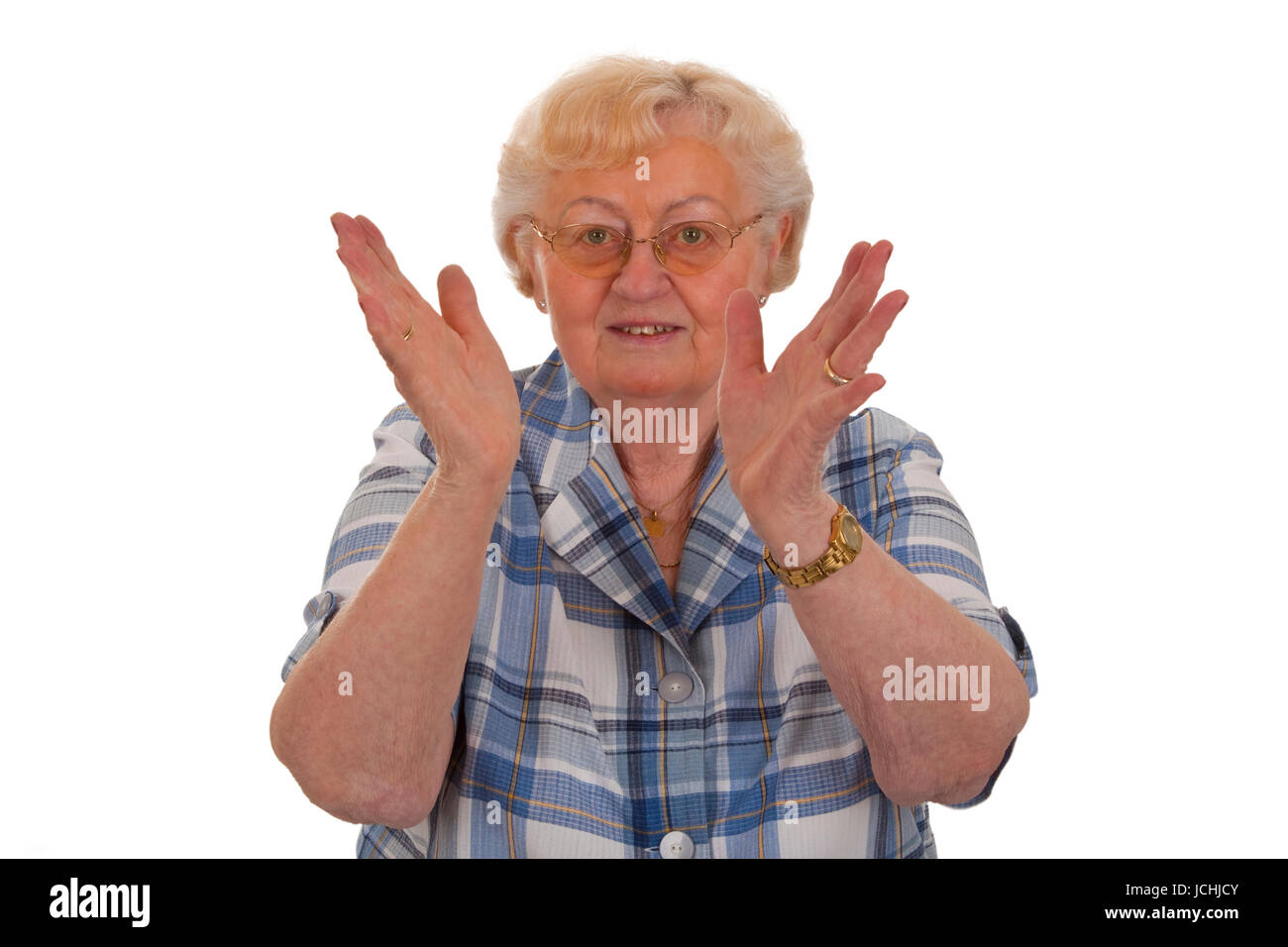 Female senior clapping her hands - isolated on white background Stock ...