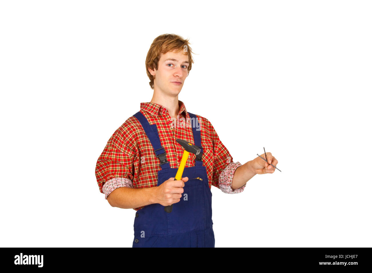 Young handcrafter with hammer isolated on white background Stock Photo ...