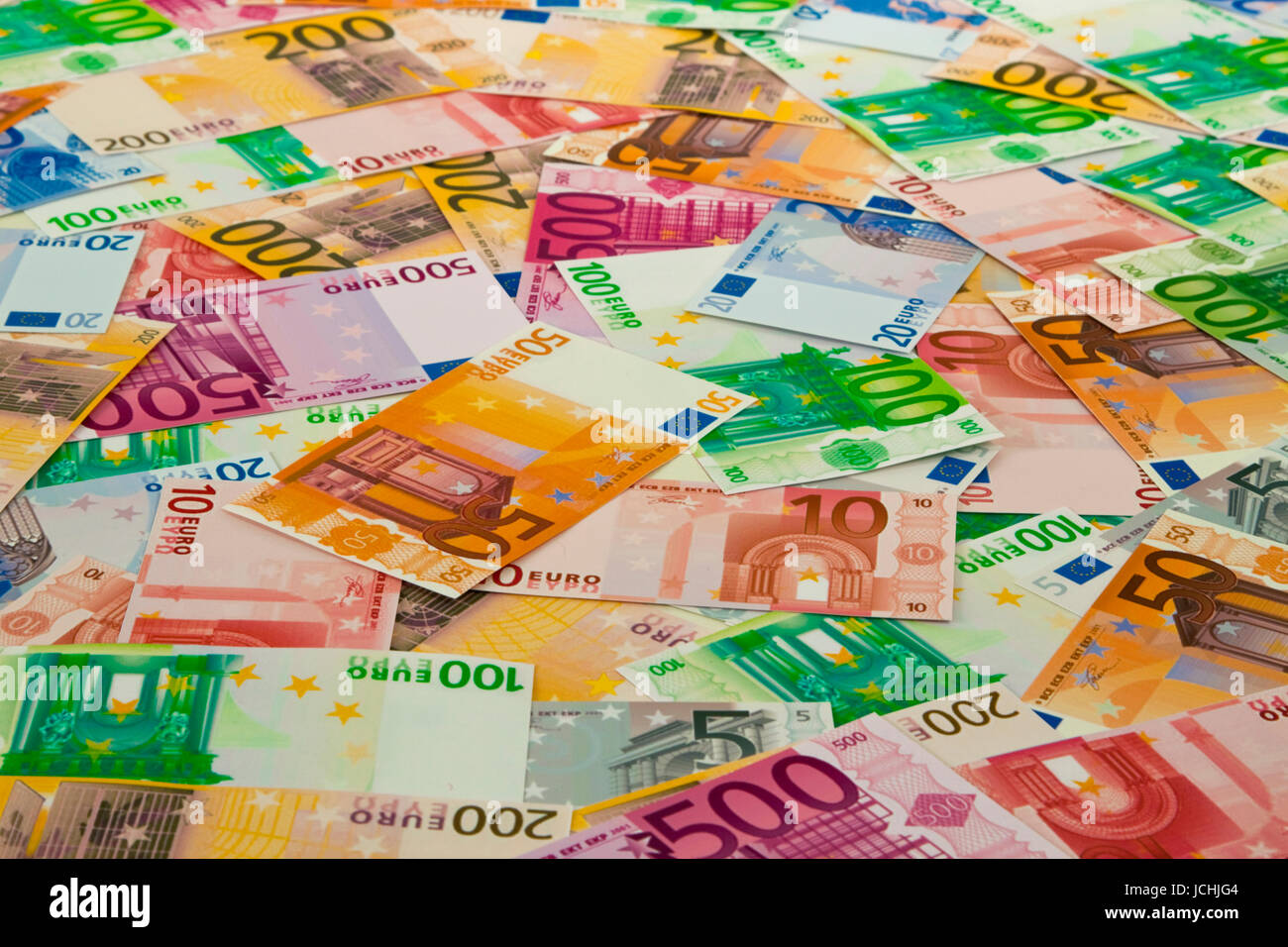 Pile of euro currency banknotes background Stock Photo - Alamy