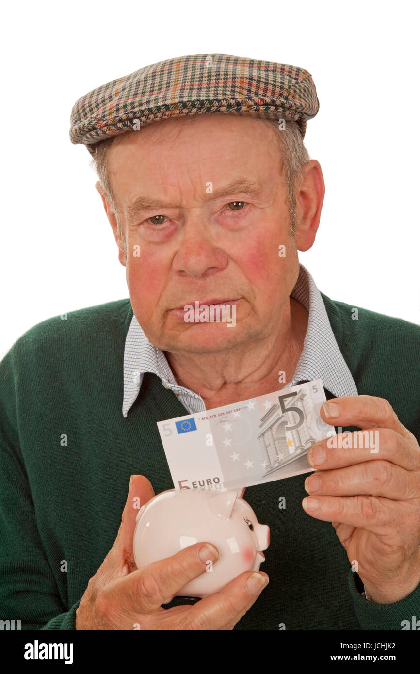 Male Senior with piggy bank isolated on white background Stock Photo ...