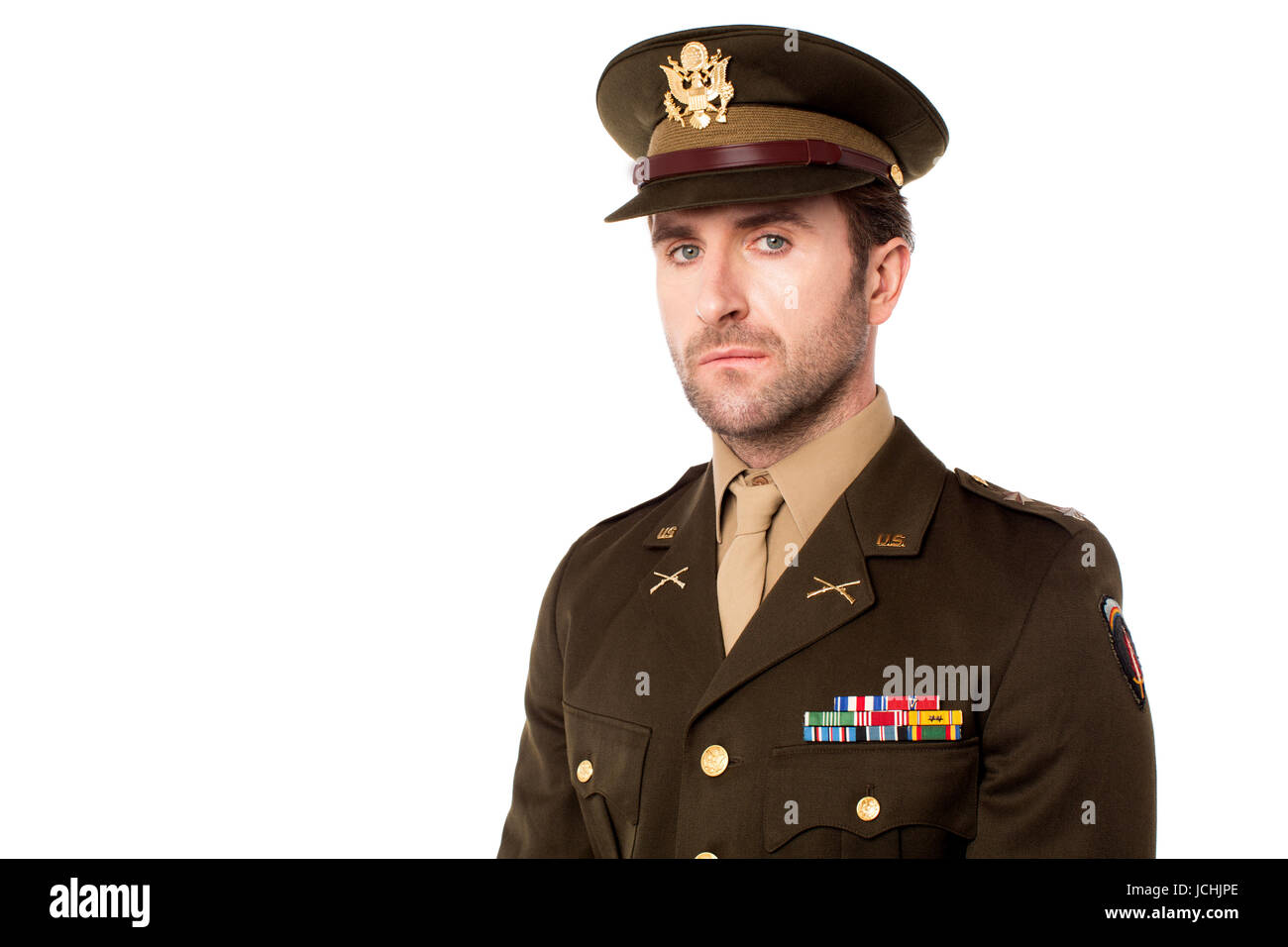 Army man in uniform posing to camera Stock Photo - Alamy