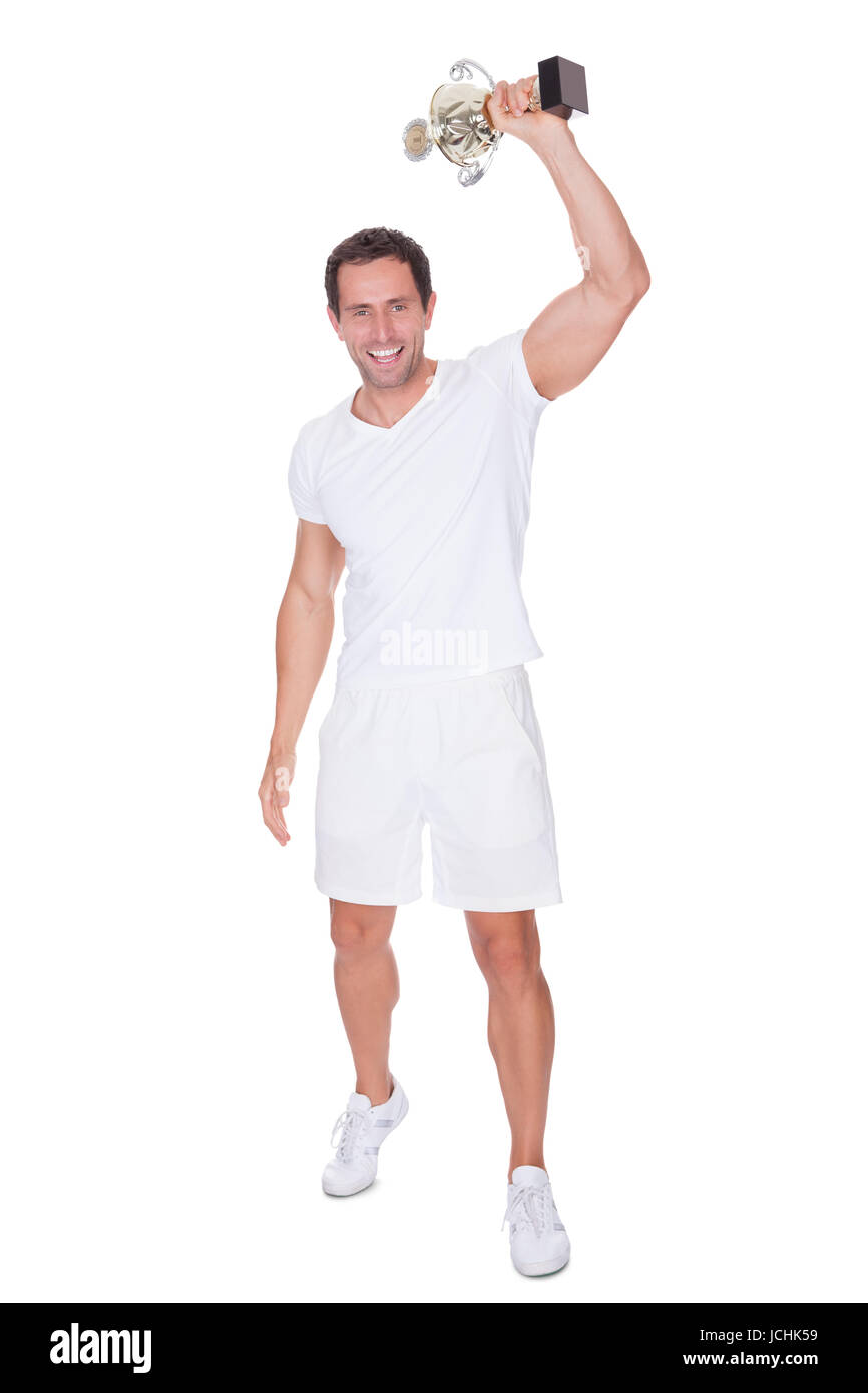Portrait Of Young Man Holding Trophy Isolated On White Background Stock ...