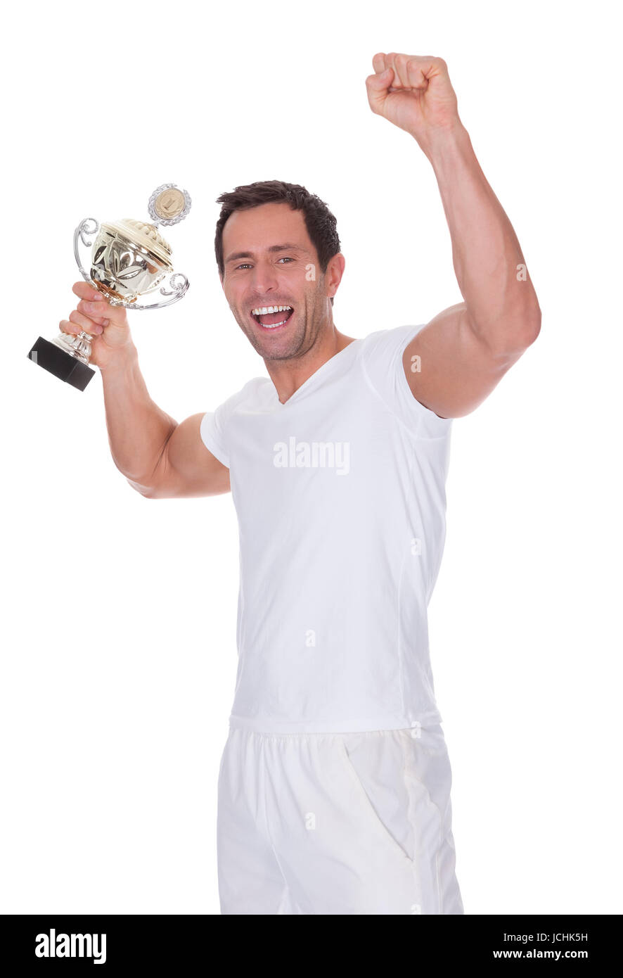 Portrait Of Young Man Holding Trophy Isolated On White Background Stock ...