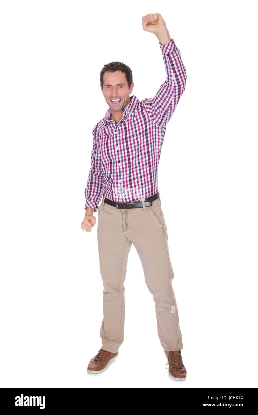 Portrait Of Young Man Cheering Isolated On White Background Stock Photo ...