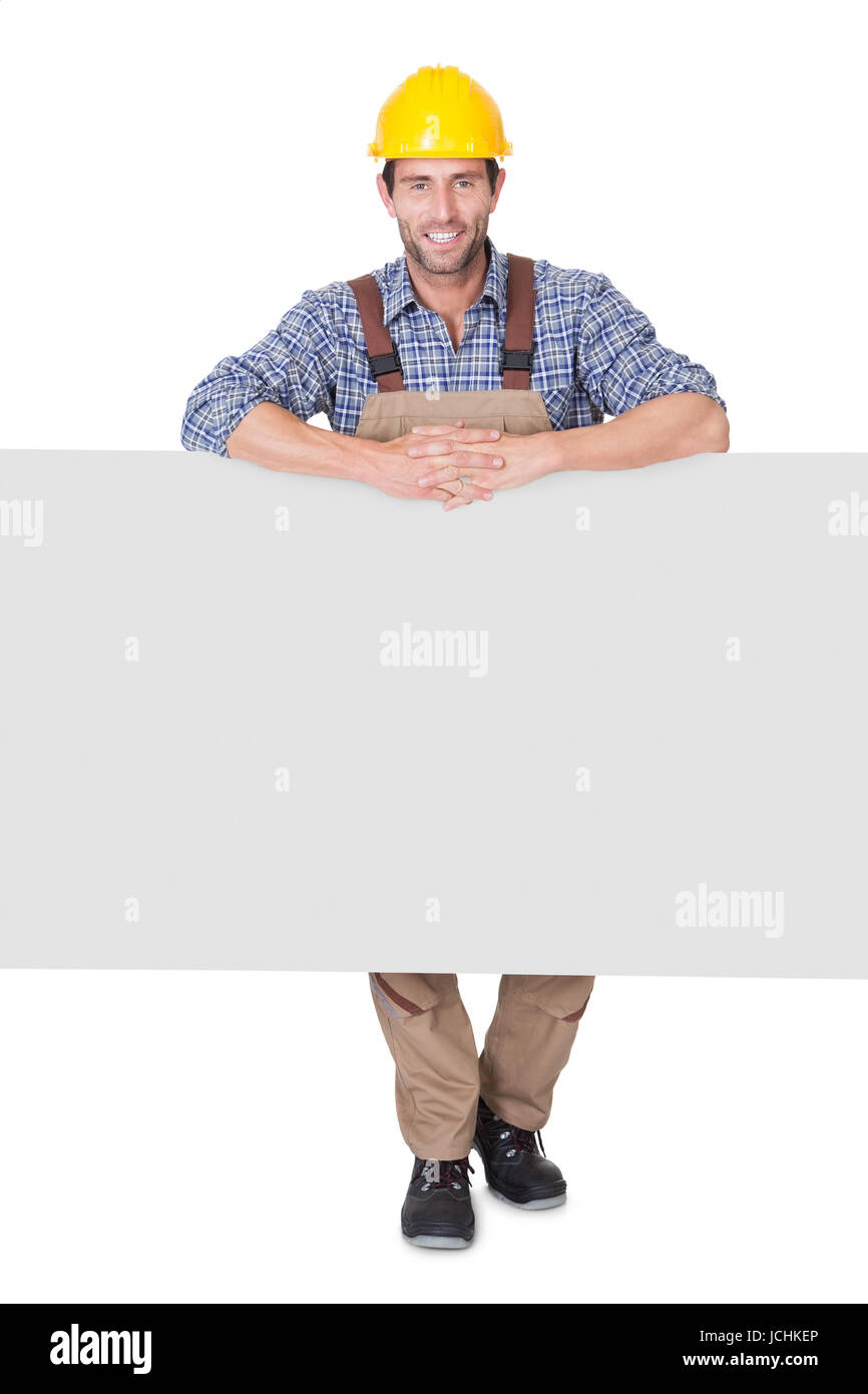 Portrait of happy construction worker presenting empty banner. Isolated on white Stock Photo - Alamy