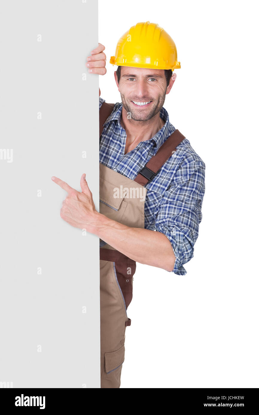 Portrait of happy construction worker presenting empty banner. Isolated on white Stock Photo - Alamy