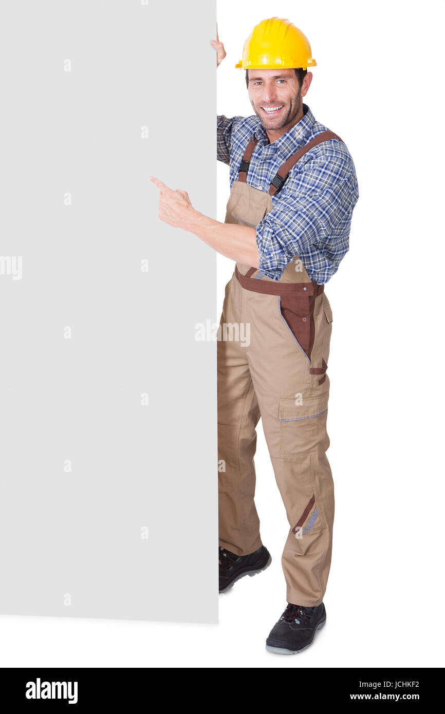 Portrait of happy construction worker presenting empty banner. Isolated on white Stock Photo - Alamy