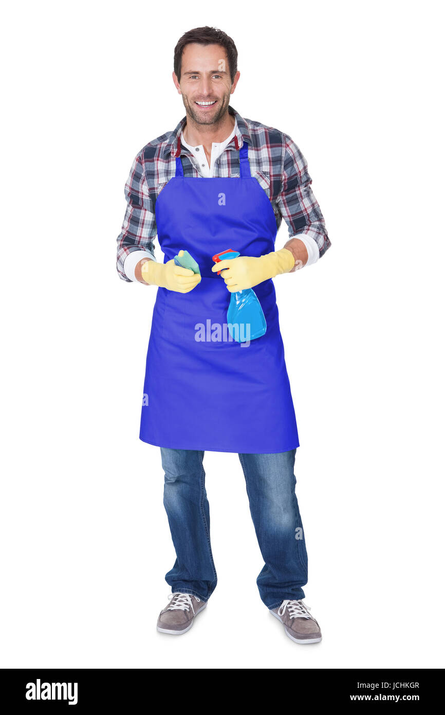 Portrait of a man with sponge and spray ready to clean windows ...