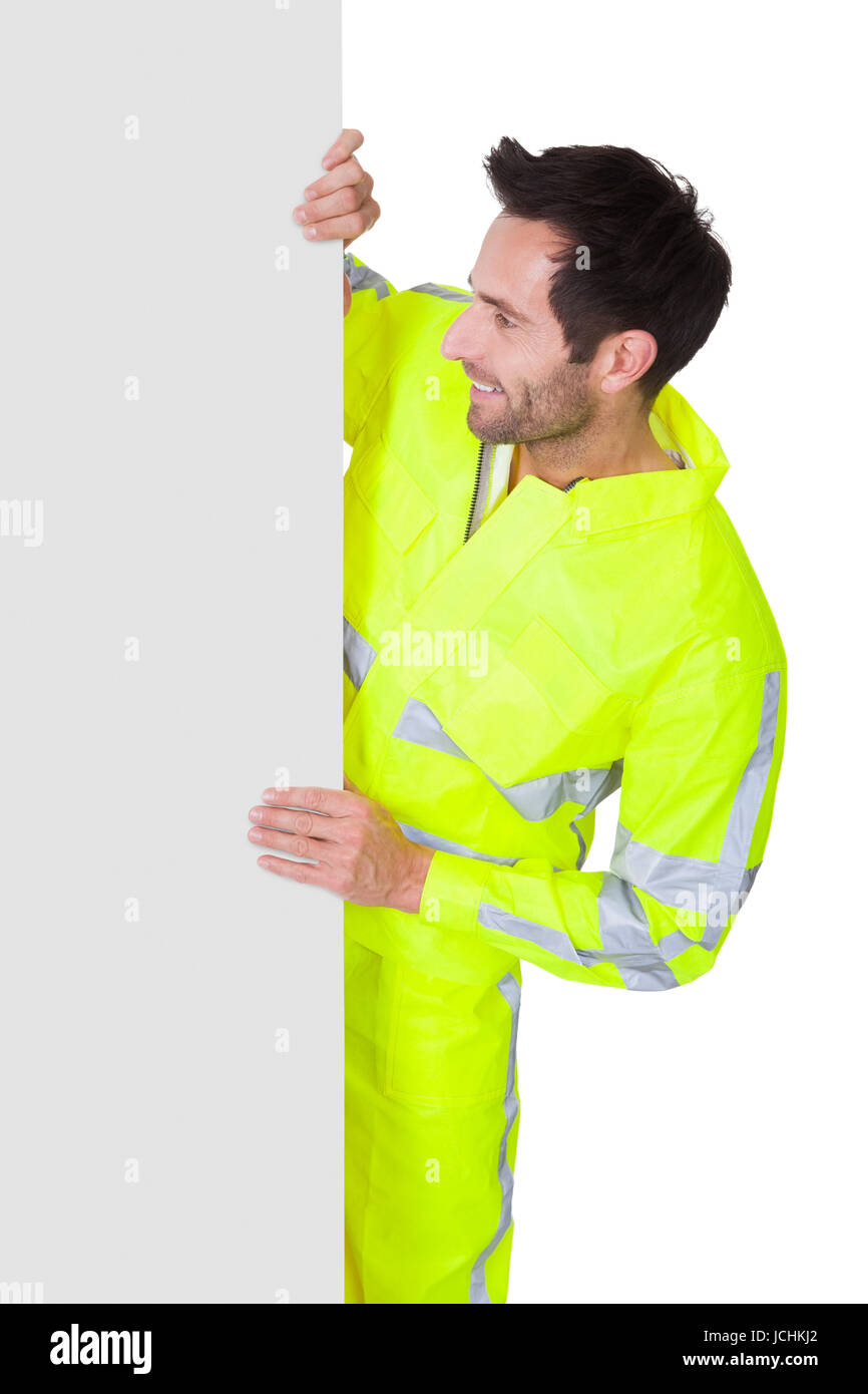 Happy worker wearing safety jacket. Isolated on white Stock Photo - Alamy