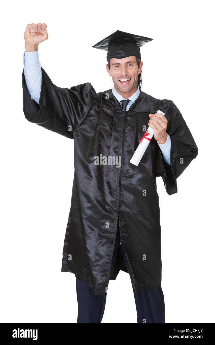 Portrait of happy graduate student cheering. Isolated on white Stock ...