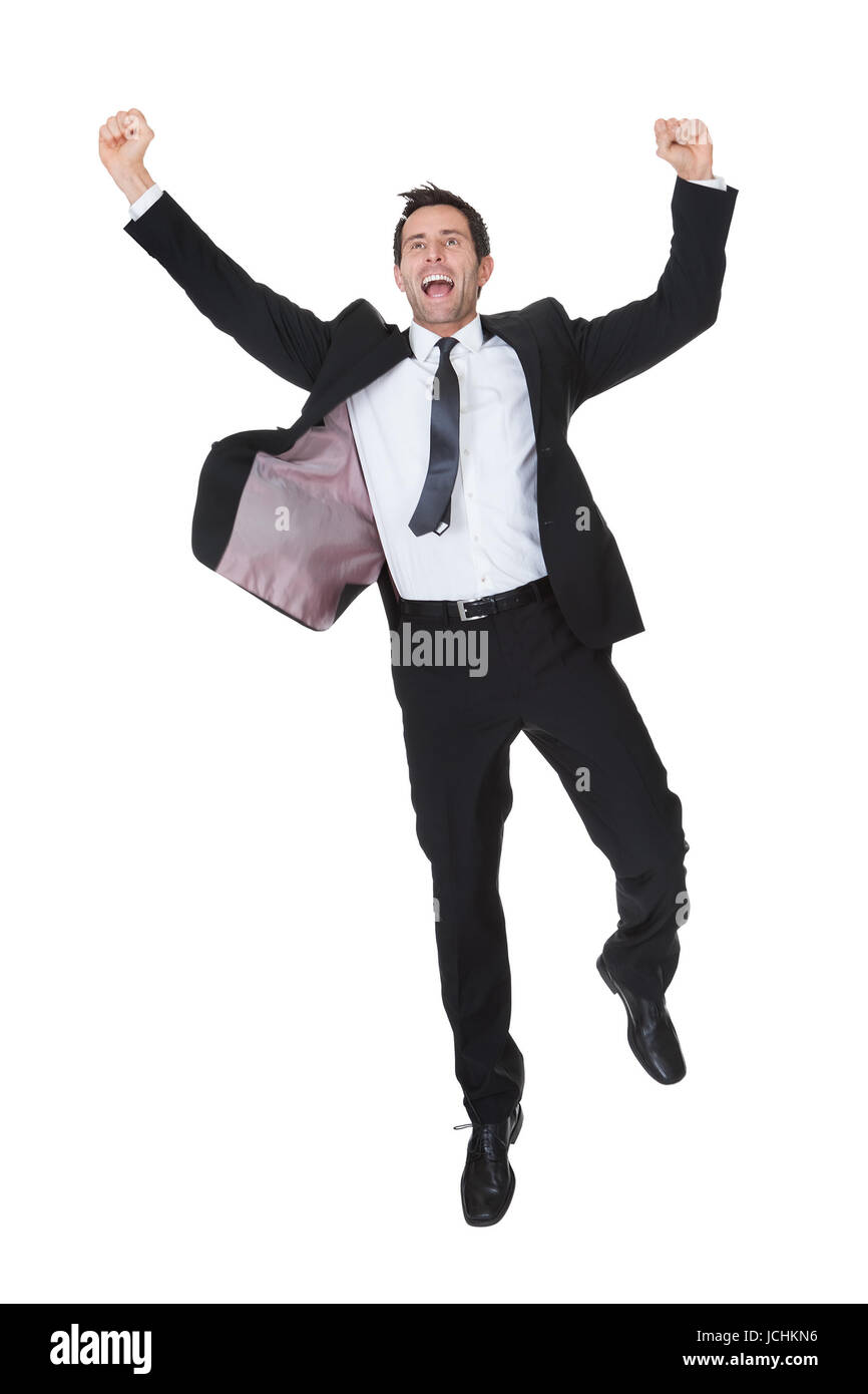 Excited businessman celebration success. Isolated on white Stock Photo ...