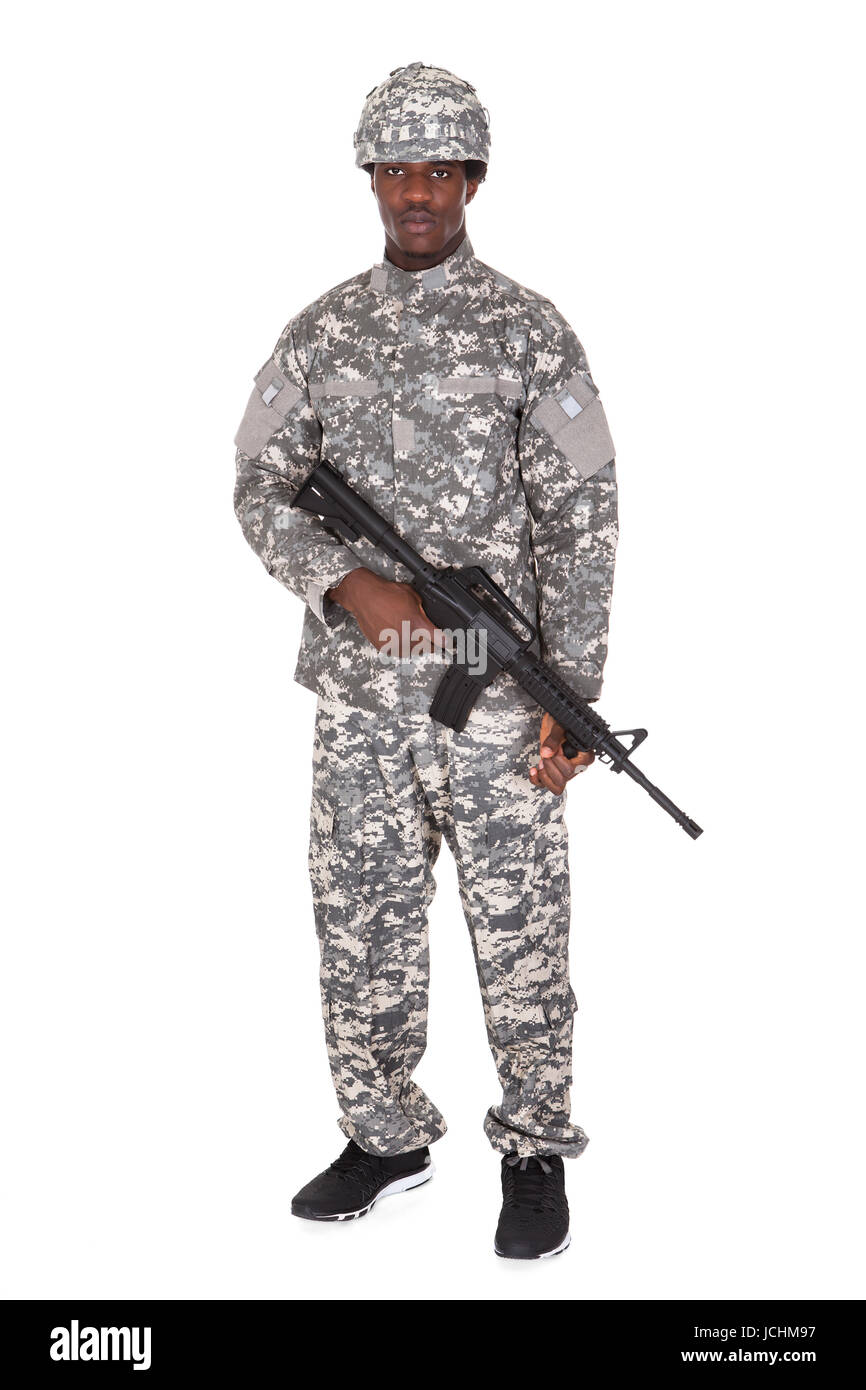 Portrait Of A African Soldier With Gun Isolated Over White Background ...