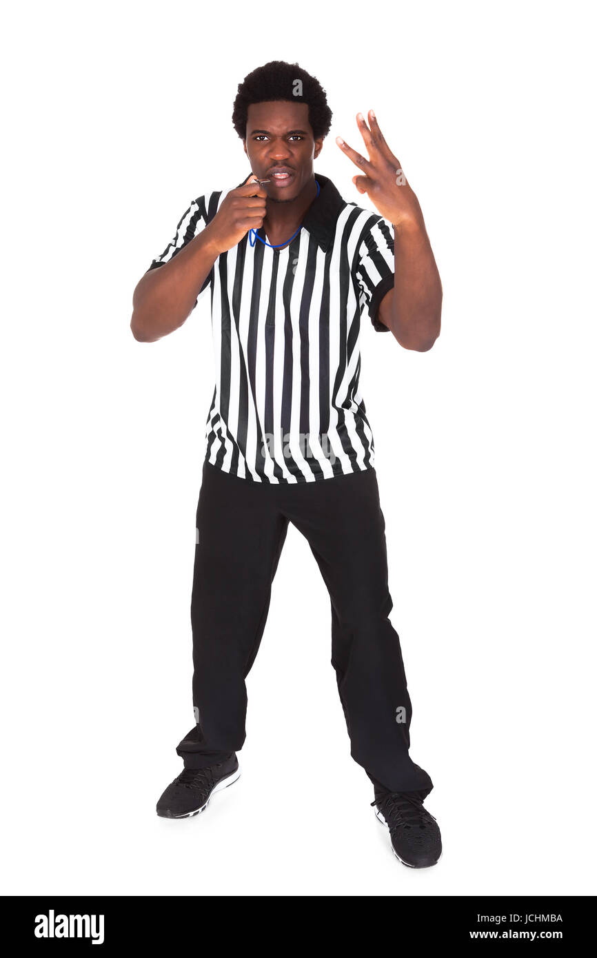 Portrait Of An African Referee Gesturing Over White Background Stock ...