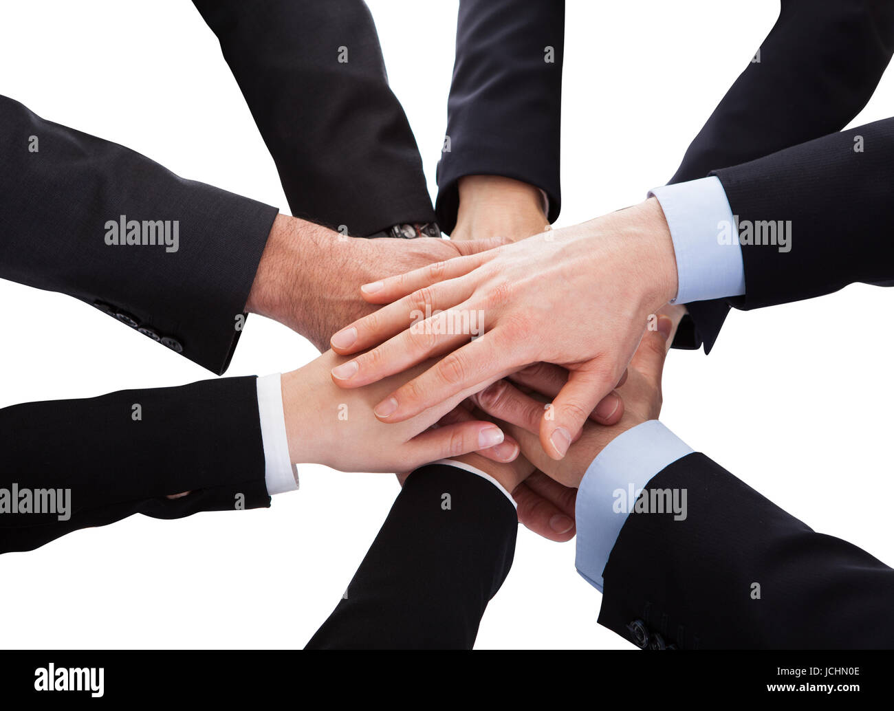 Group Of Business People Stacking Hand Over Each Other On White ...