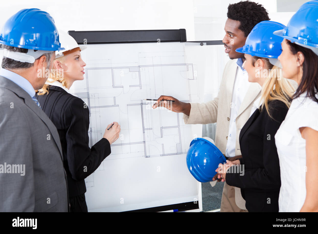 Diverse team engineer architects working hi-res stock photography and ...