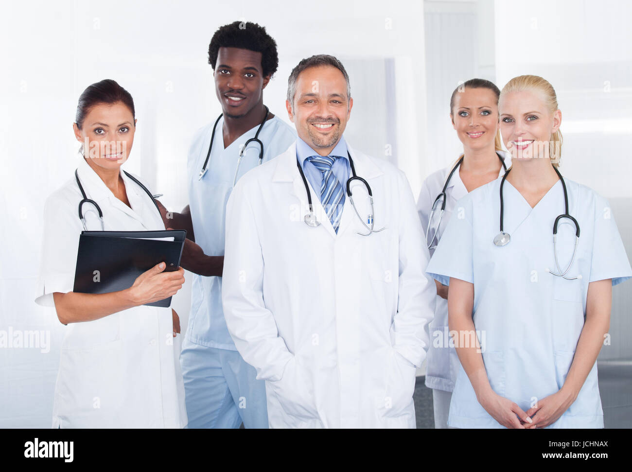 Portrait Of Successful Multiracial Doctors In Clinic Stock Photo - Alamy