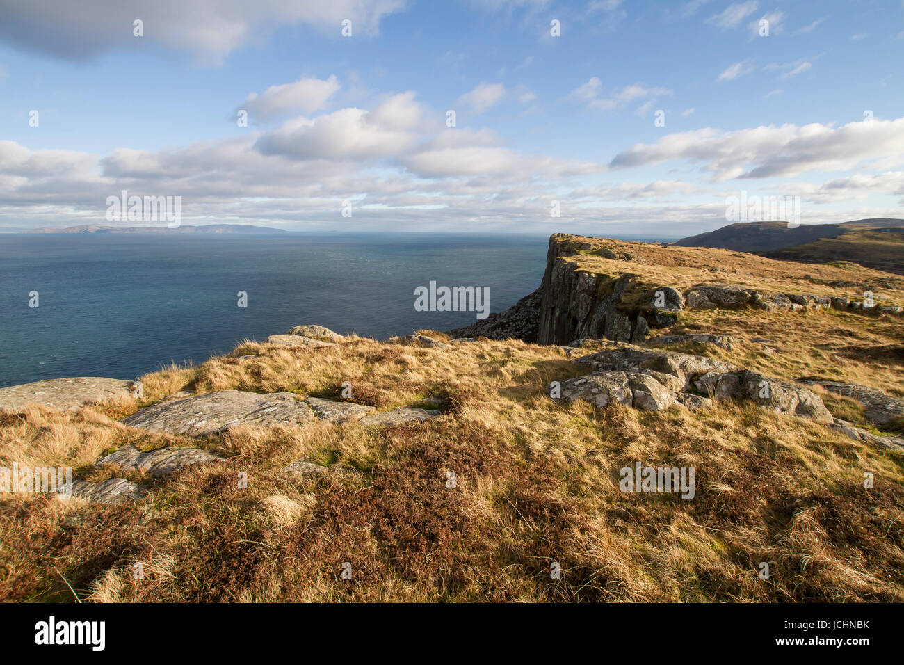Cliiff at Fair Head, County Antrim, Northern Ireland. In the distance ...