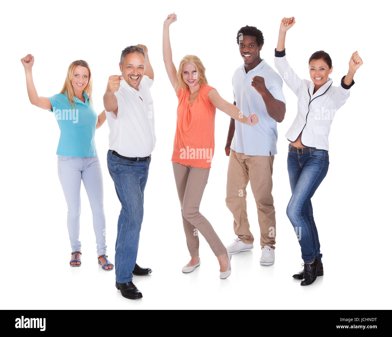 Diverse group happy friends raising Cut Out Stock Images & Pictures - Alamy