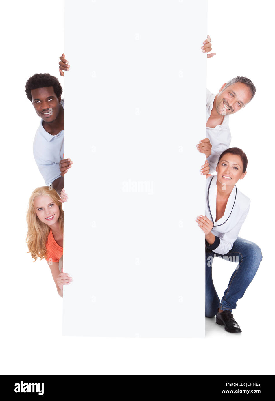 Happy Casual Group Of People Holding Placard Over White Background ...