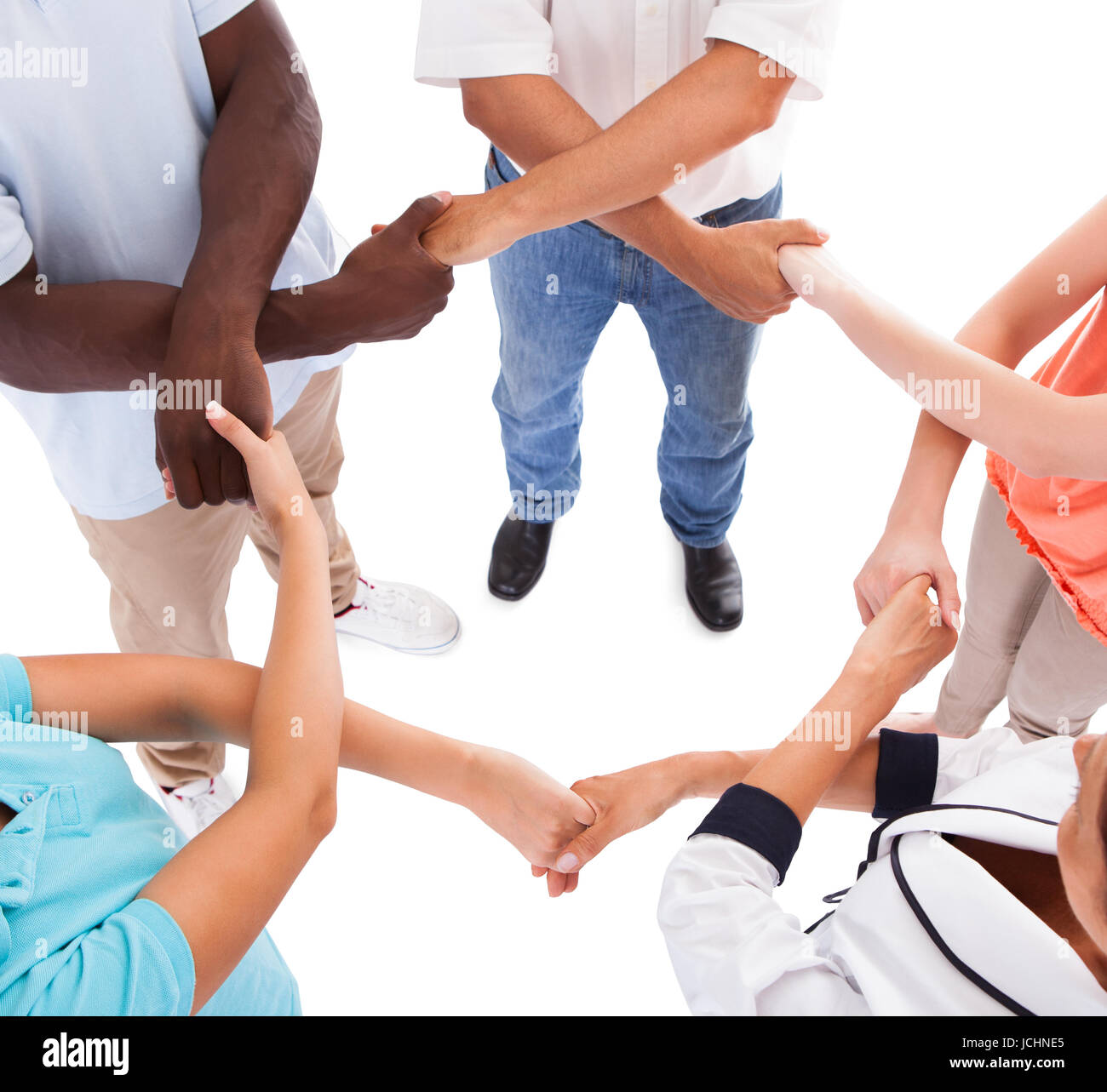 Close-up Of Group Of People Holding Hand Over White Background Stock ...
